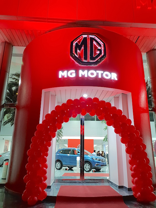 MG Motor opens new showroom, announces benchmark benefits ...